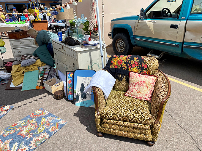 Eclectic doesn't even begin to cover it! This booth is like your grandma's attic and a thrift store had a beautiful baby.