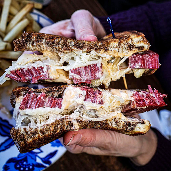 This isn't just a Reuben sandwich&mdash;it's a skyscraper of corned beef, sauerkraut, and Swiss cheese that requires both hands and a strategy.