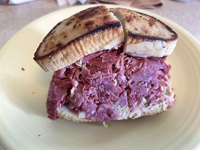 The Leaning Tower of Pastrami! This sandwich isn't just a meal, it's an engineering marvel that would make Frank Lloyd Wright jealous.