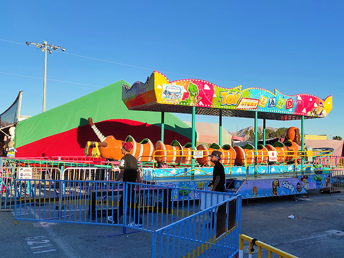 Whirl and twirl! This colorful ride is like a spinning top come to life, promising giggles and maybe a touch of dizziness for the young and young-at-heart.