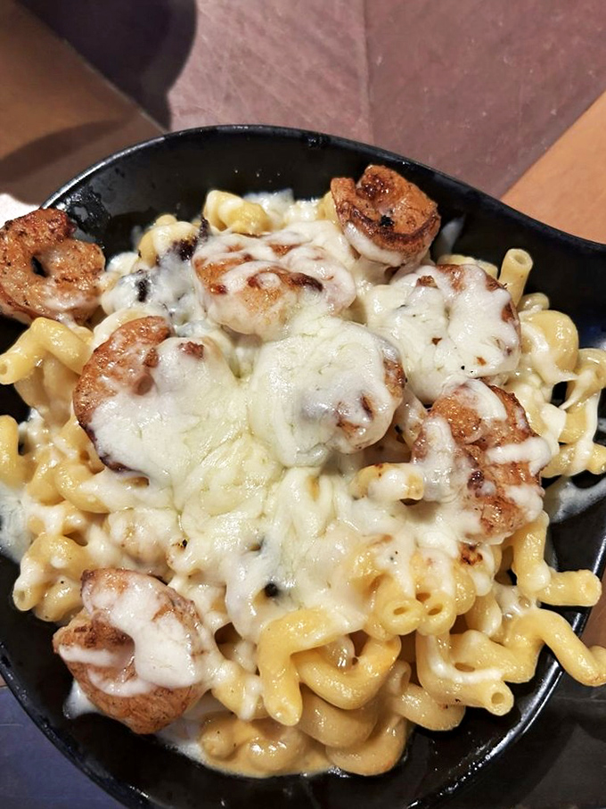 This skillet of mac and cheese with perfectly seared shrimp isn't just a side dish&mdash;it's the main event that will haunt your cheese-related dreams.