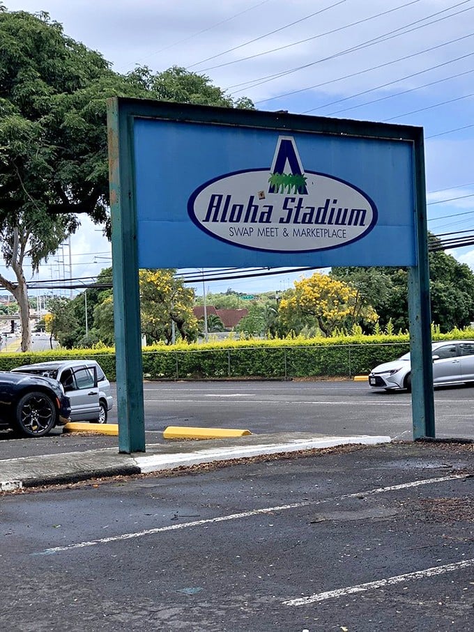 The gateway to bargain paradise! This sign marks the spot where wallets open and souvenir dreams come true.