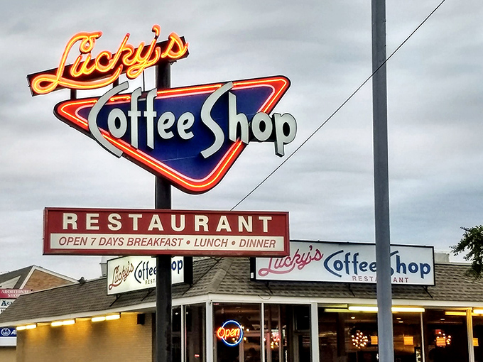 Lucky's by day, Lucky's by night! This sign shines like a beacon for hungry souls, promising sustenance 'round the clock.