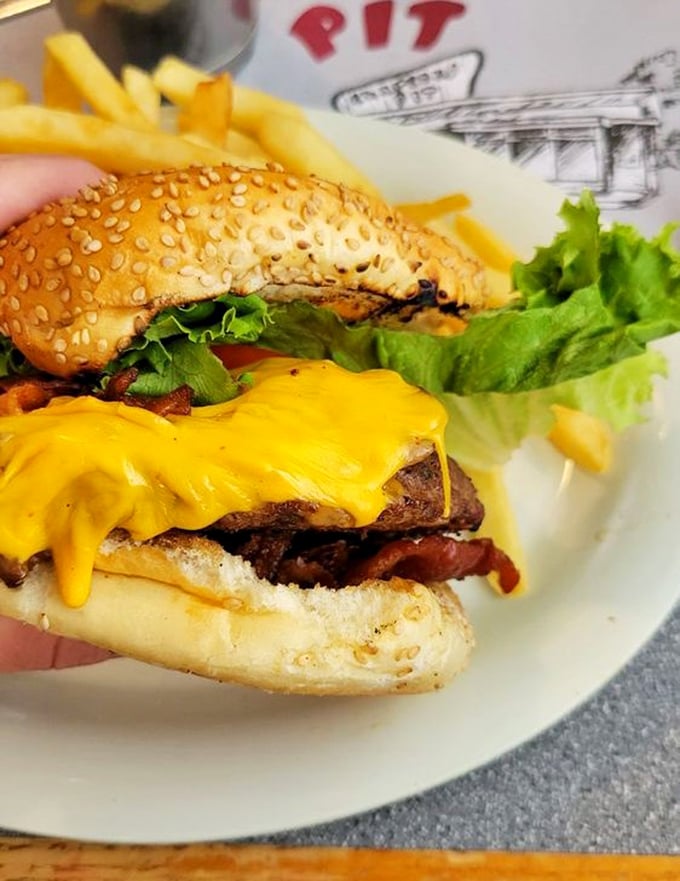 Meet the Summit Burger: a towering achievement in the field of deliciousness. It's like the Everest of burgers &ndash; you'll want to conquer it!