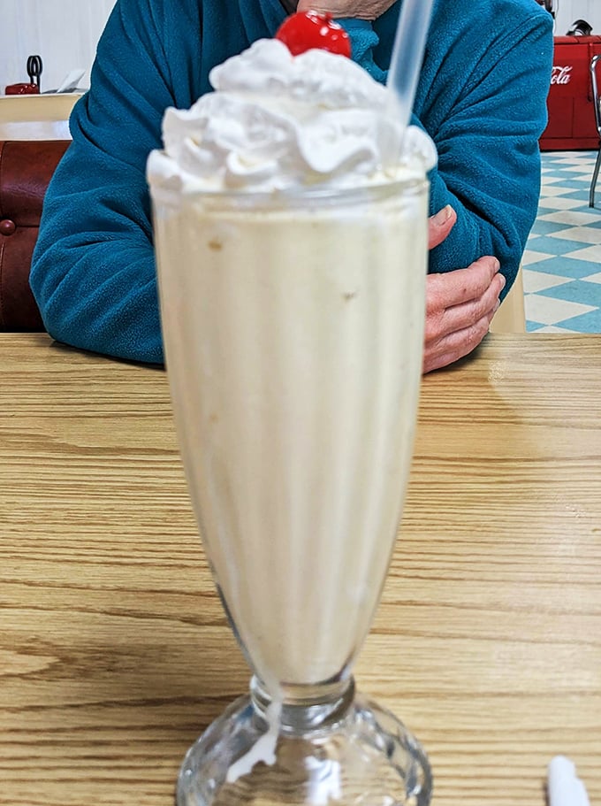 Vanilla shake or cloud in a glass? Either way, it's topped with a cherry so perfect, it could be in a still life painting.