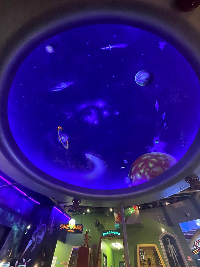Look up and blast off! This ceiling mural is like a planetarium, minus the stuffy narrator and uncomfortable seats.