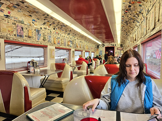 Red booths so inviting, you'll want to slide right in and stay awhile. The perfect spot for plotting your next sock hop.