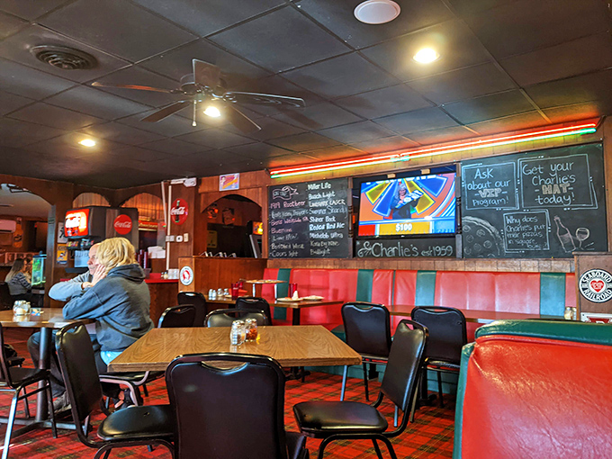 Booths that have heard a thousand stories, and pizzas that could tell a thousand more. Charlie's: where every slice is a local legend.