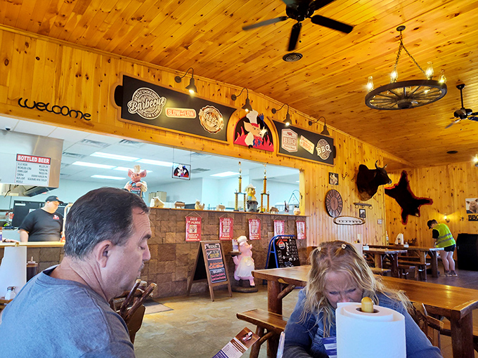 Diners experiencing what can only be described as "barbecue bliss." That wood-paneled dining room has witnessed countless sauce-stained smiles.