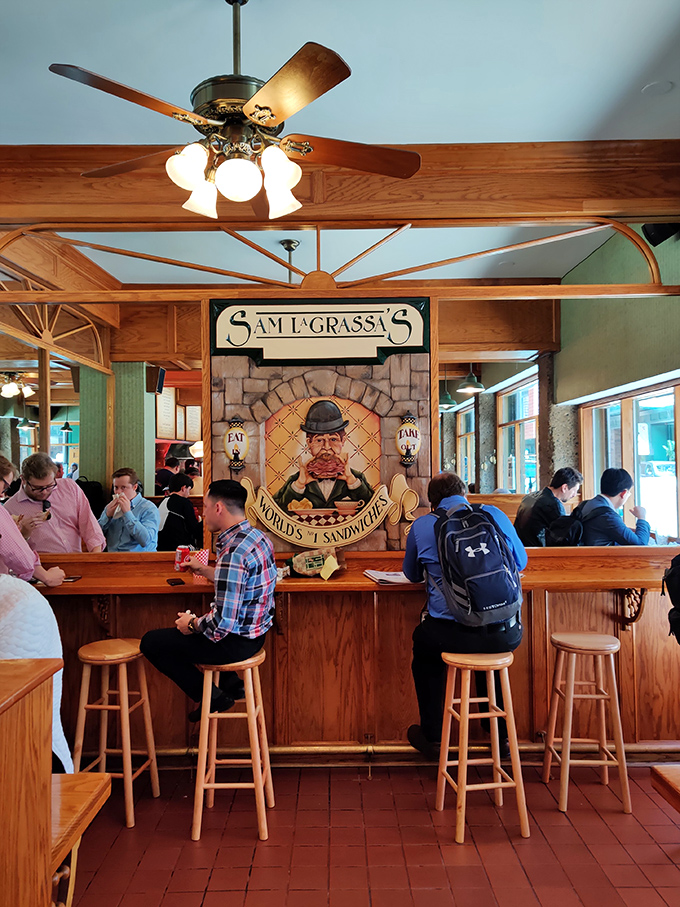 Lunchtime at Sam LaGrassa's: Where strangers become friends, united by their love for epic sandwiches.