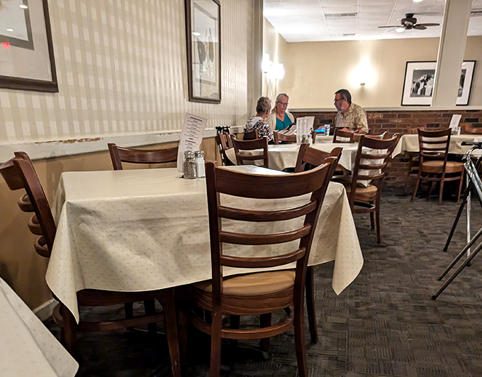 Where friendships deepen over white tablecloths and shared stories. Notice nobody's looking at their phones&mdash;the food commands full attention.