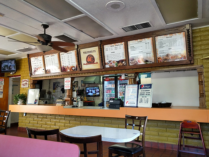 The gateway to gastronomic bliss! This order counter is where dreams come true and diets go to die.