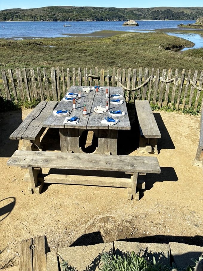 Al fresco dining at its finest! This rustic picnic table is your front-row seat to a feast of epic proportions.