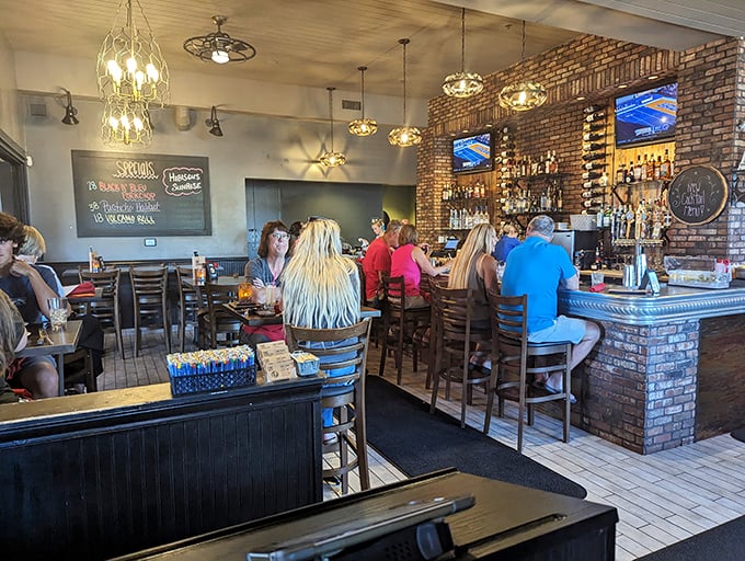 The bar area: Where seafood dreams come true and cocktails flow like the tide. It's the kind of place where everybody knows your name... or at least your favorite fish dish.