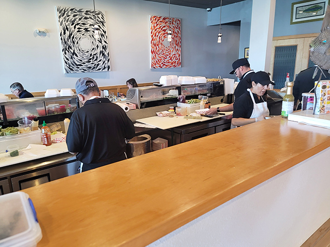 Behind the scenes at seafood central. These kitchen maestros are orchestrating a symphony of flavors just for you.