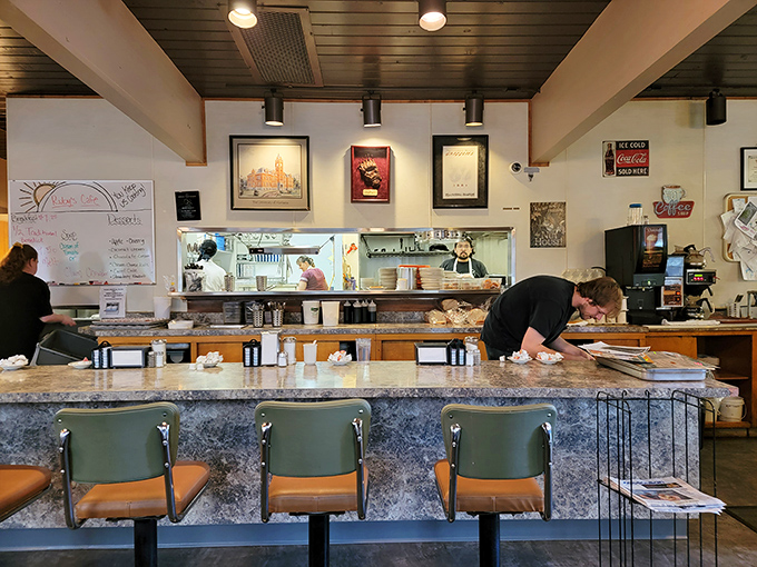 The kitchen crew: Culinary conductors orchestrating a symphony of sizzles, flips, and "Order up!" It's breakfast theater at its finest.