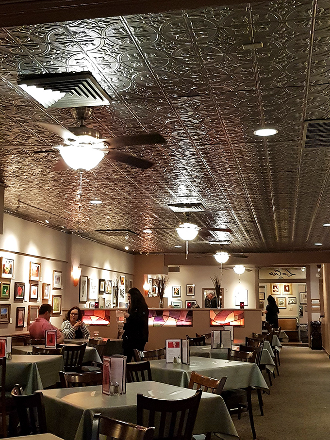 Where vintage meets vogue! La Casa's dining room is a feast for the eyes, with its ornate ceiling and cozy ambiance.