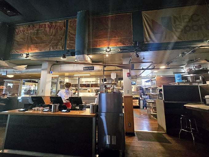 Behind the scenes at flavor central. Big Ed's kitchen crew works their magic, turning dough into dreams.