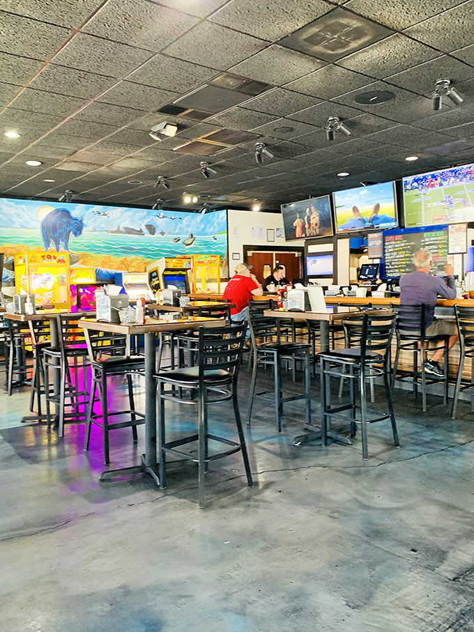 Where the magic happens&mdash;the bar area featuring buffalo murals and enough TVs to satisfy even the most dedicated sports multitasker.