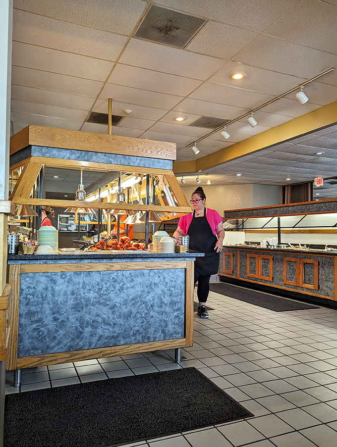 Meet the unsung hero of your dining experience. This staff member is ready to guide you through a gastronomic journey of epic proportions.