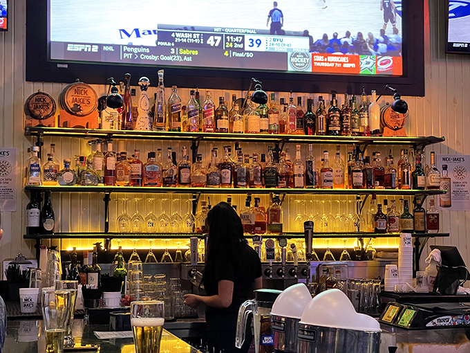 Behind that impressive bar is where liquid happiness is crafted while sports play on screens &ndash; multitasking at its finest.