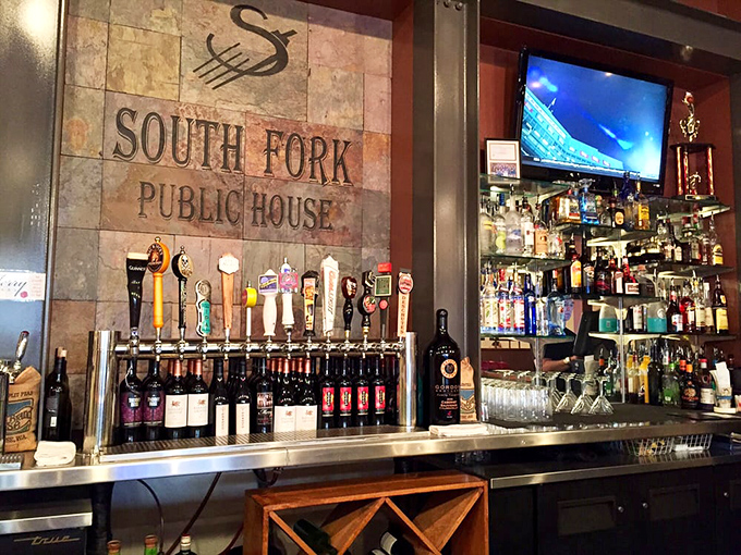 That stone wall backdrop isn't just decoration&mdash;it's the perfect stage for South Fork's impressive lineup of spirits waiting to become your new favorite cocktail.