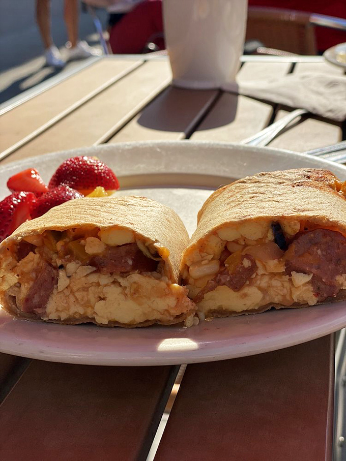 Andouille sausage meets breakfast burrito in a flavor explosion that'll wake up your taste buds faster than a triple shot espresso.