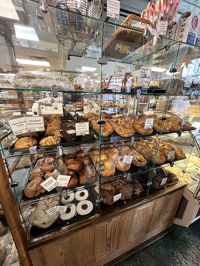 A display case that would make Mary Berry weep tears of buttery joy. These pastries are so pretty, they belong in the Louvre.