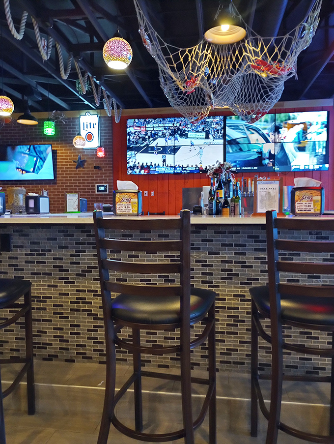 Anchors aweigh at the bar! With TVs like that, you can catch the game while the bartender catches your next round.