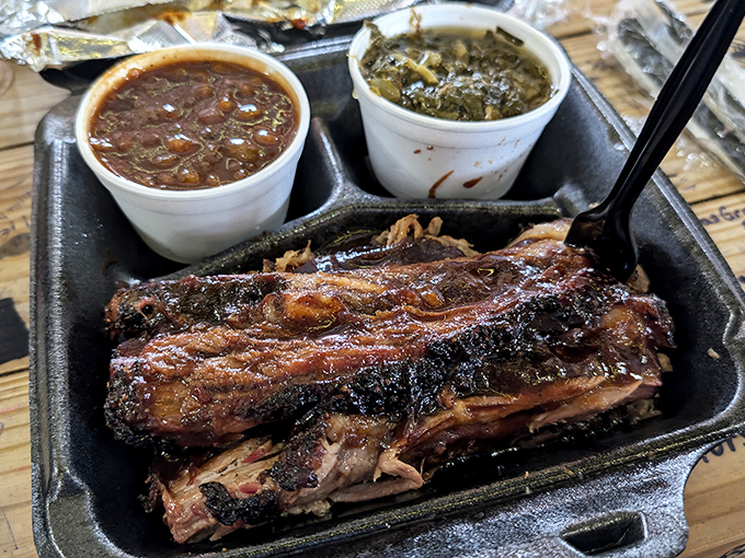 Brisket so tender, it practically melts on the plate. Paired with those sides, it's like a hug for your stomach from a pitmaster angel.