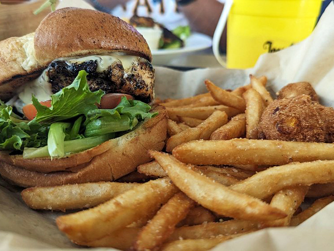 Land ho! This burger's like a beefy lighthouse guiding you through a sea of crispy, golden fries.