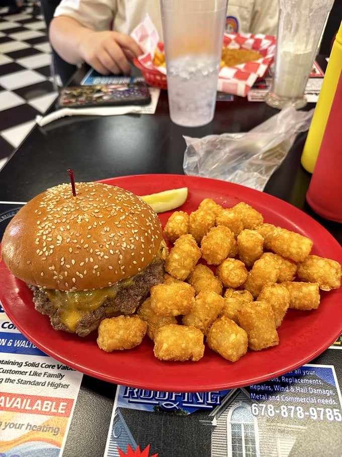Burger bliss! This juicy masterpiece and its crispy sidekicks are the dynamic duo your taste buds have been waiting for.
