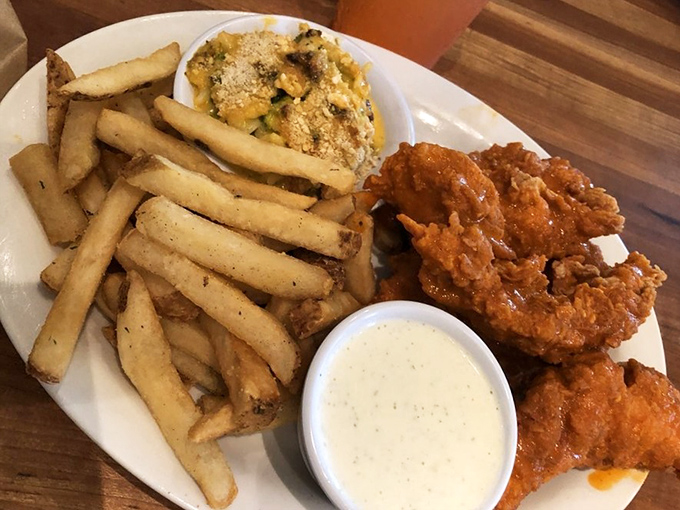 Chicken tenders that actually look like chicken, fries with personality, and mac and cheese that's clearly not from a box. Comfort food trifecta achieved.