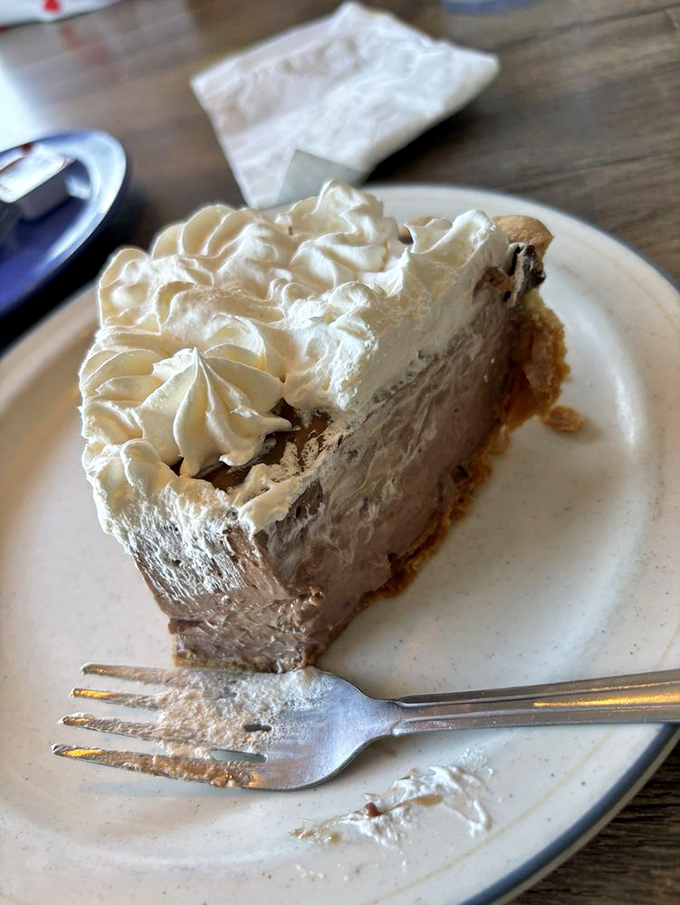 Chocolate cream pie so decadent, it should come with its own warning label. One bite, and you'll be planning your next visit.