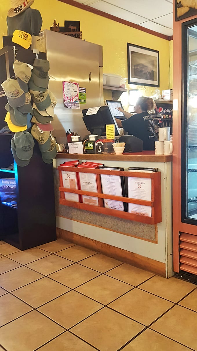 The heart of Cowboy Cafe operations. Those hats aren't just decor; they're a promise of authenticity (and protection from the Wyoming sun).