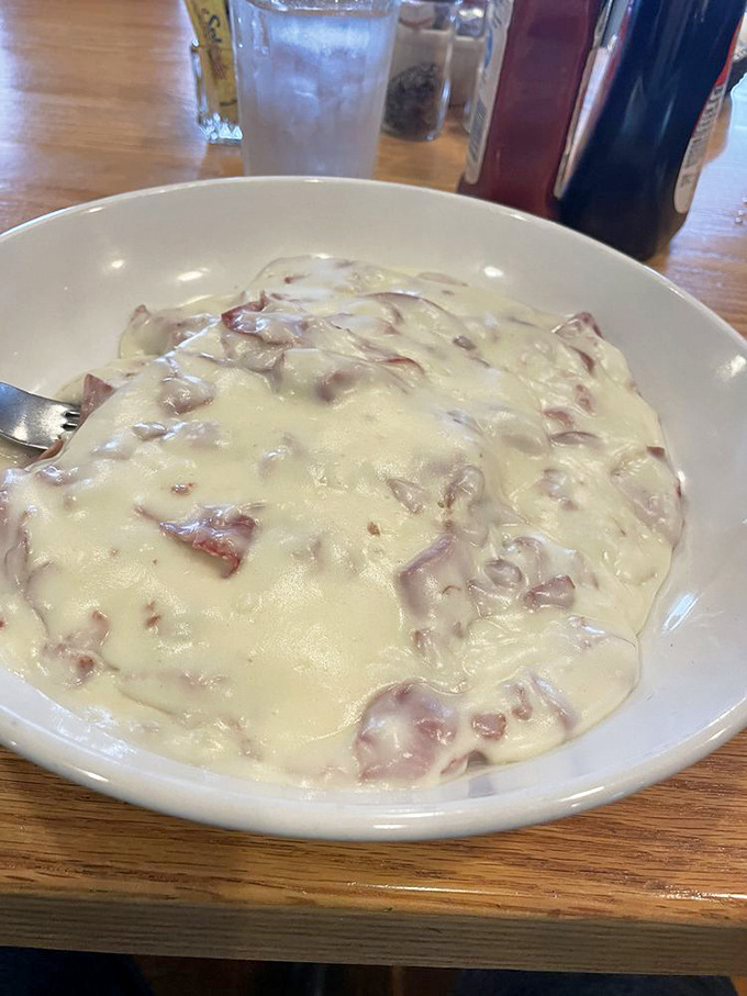 Behold the legendary cream chipped beef! It's like a warm, savory hug for your taste buds. Comfort food so good, it might just solve world peace... or at least breakfast indecision.