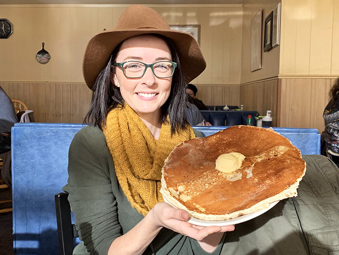 That pancake isn't just large&mdash;it's practically its own zip code. When breakfast requires two hands and possibly a map.