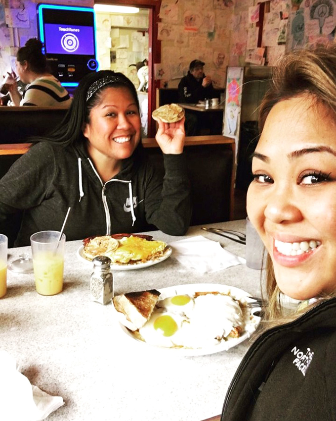 Happy diners caught in their natural habitat. Notice the rare "pre-food coma" glow on their faces.