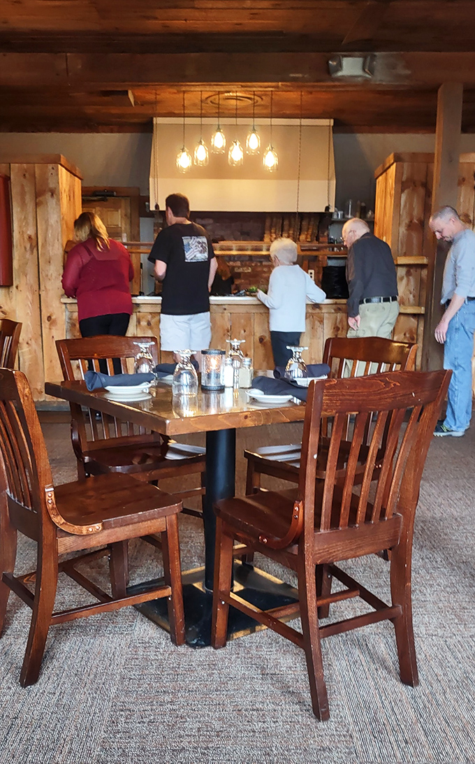 Where strangers become friends over shared plates. This bustling dining room is the heart of The Publyk House experience.