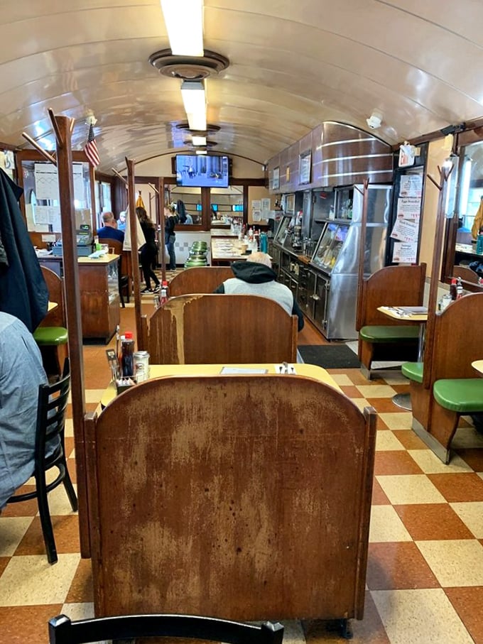 The diner's narrow aisle has witnessed countless coffee refills, breakfast debates, and the birth of food-induced happiness.