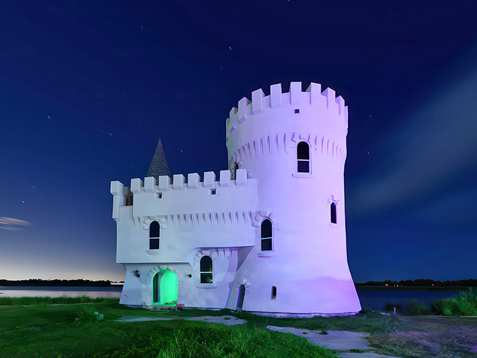 Lights, camera, enchantment! Under the cover of darkness, this little castle becomes a glowing gem, ready for its close-up in a fairy tale blockbuster.