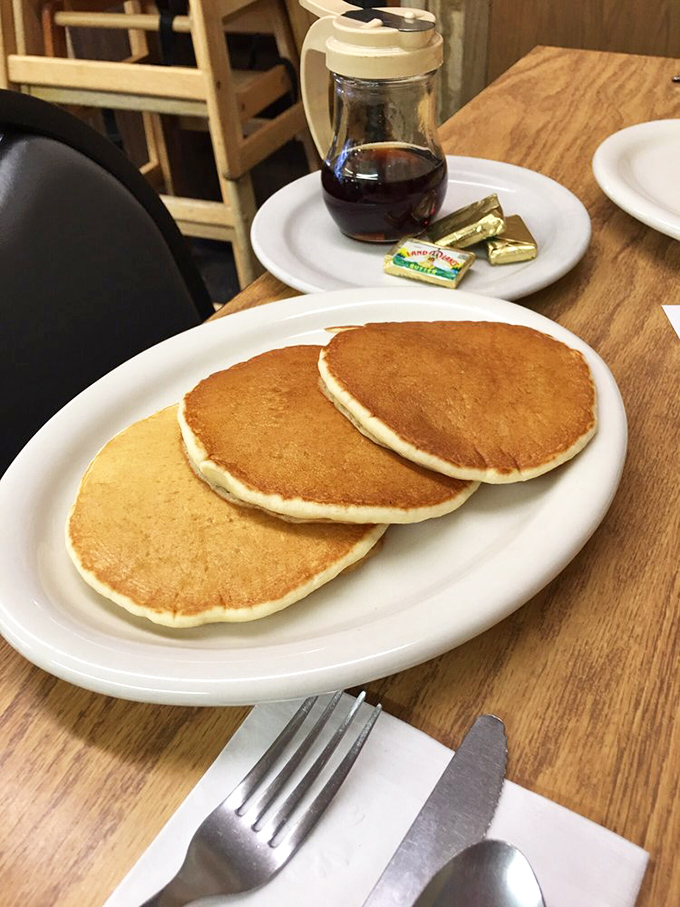 Pancakes so fluffy, they could double as pillows. Warning: May induce extreme coziness and the urge to cancel all plans.