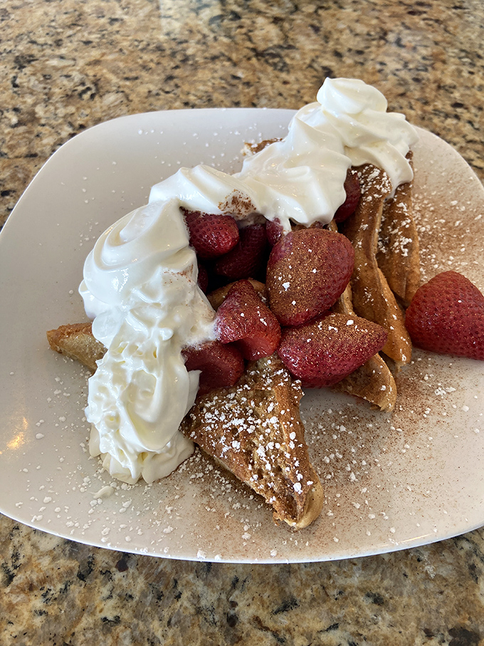 French toast that puts the "ooh la la" in breakfast. Topped with fresh berries and cream, it's almost too pretty to eat. Almost.