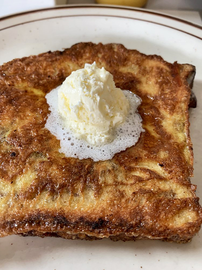 French toast that puts the "ooh la la" in breakfast! Topped with a dollop of butter that's melting almost as fast as your heart.