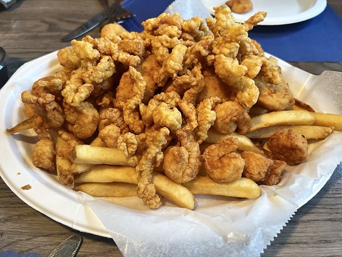 Fried seafood fantasy! This golden mountain of oceanic delights is a crispy, crunchy testament to the joys of deep-frying.