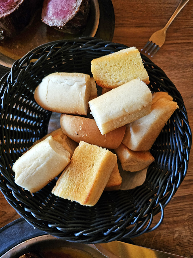 Carb lovers, rejoice! This garlic bread basket is like a warm, buttery hug for your mouth. Resistance is futile.