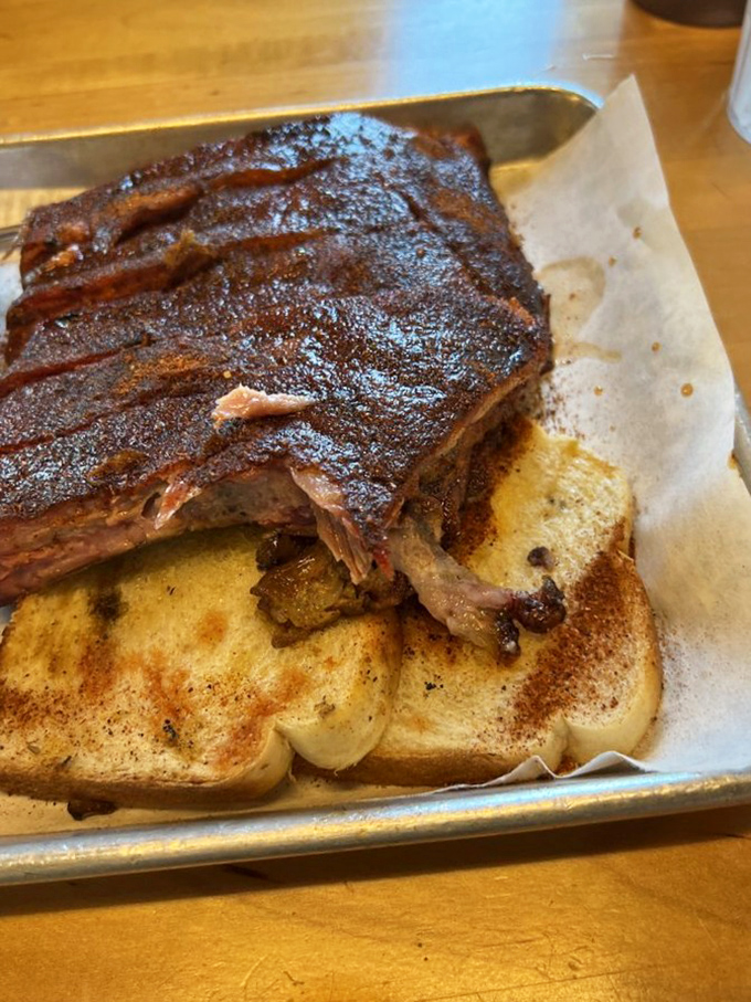 Meat masterpiece alert! This half slab of ribs on Texas toast looks so good, it could make a vegetarian reconsider their life choices.