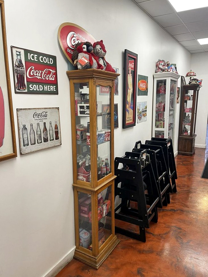 A hallway that's a shrine to the almighty Coca-Cola. It's like walking through a fizzy, caffeinated time capsule of Americana.