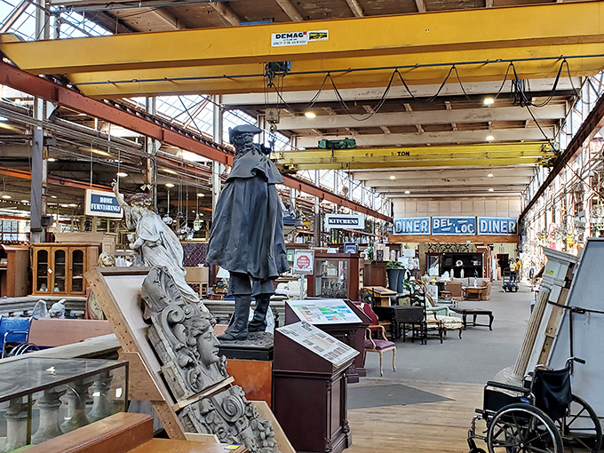 Statues, wheelchairs, and chandeliers, oh my! This eclectic mix is like a movie set designer's fever dream.