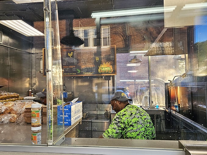 Behind the glass: Where barbecue magic happens. It's like Willy Wonka's factory, but with more smoke and fewer Oompa Loompas.